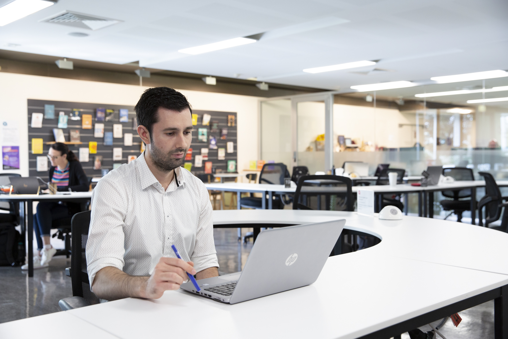 Man using computer | State Library of Queensland