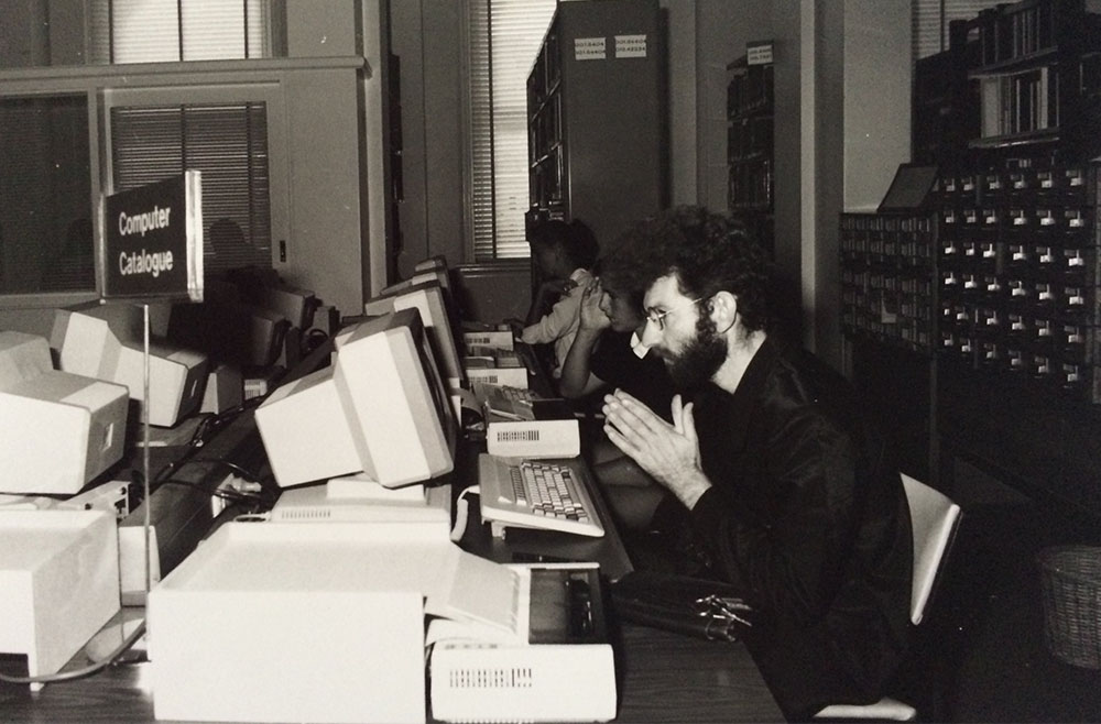 Readers consulting computer terminals, 1987 | State Library of Queensland